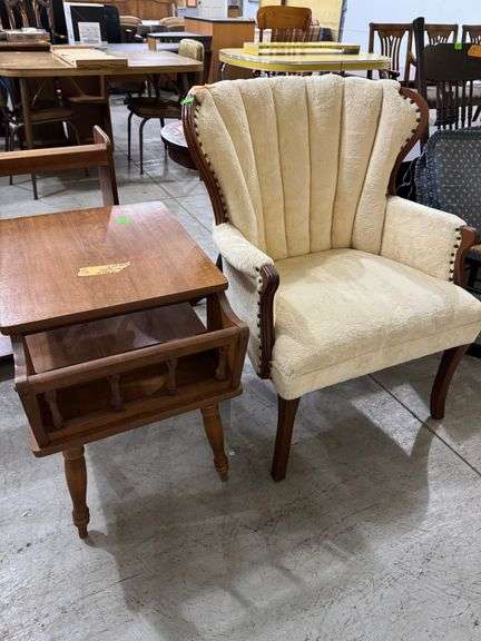 Overstuffed chair and end table. End table has water damage ...