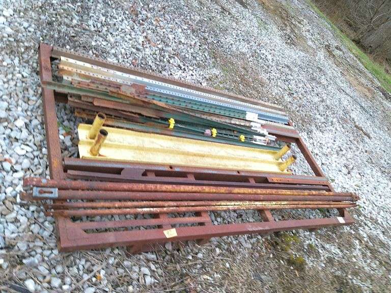 Scaffolding cross members, 15 five foot T posts, 4 seven foot road sign ...