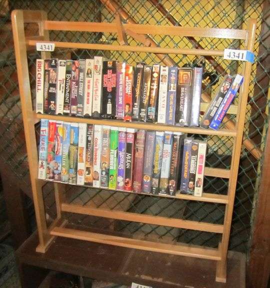 VHS tapes including Disney with wood rack - Mark Van Hook, Auctioneer