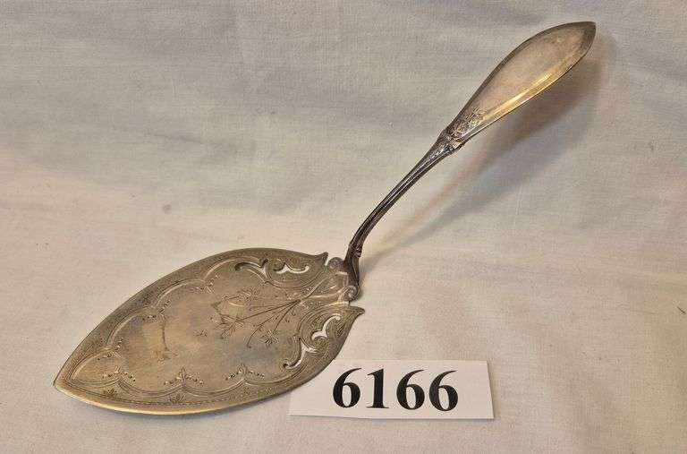 Ornate Sterling Silver cake server - Mark Van Hook, Auctioneer