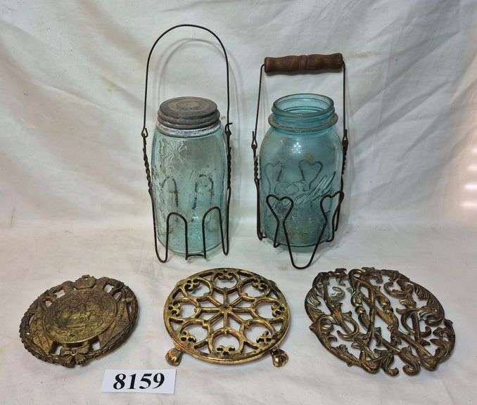 Two vintage canning jars in wire holders, three trivets - Mark Van Hook ...