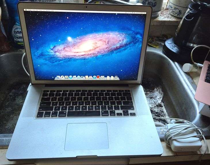 Apple MacBook Pro Laptop computer - Mark Van Hook, Auctioneer