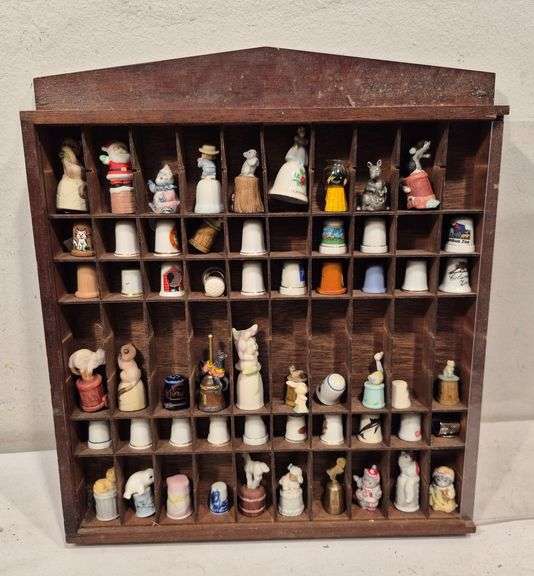 Thimble and miniature figurine collection in wall hanging display case ...