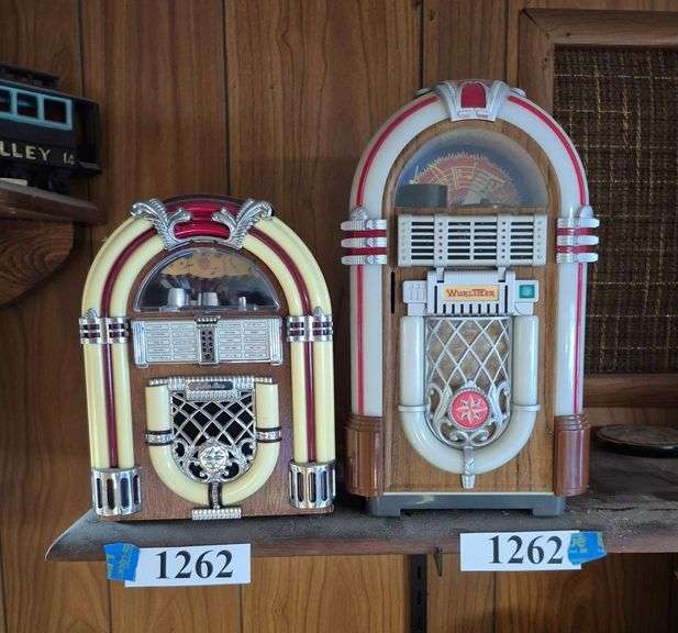 Two small battery operated jukebox Style radios - Mark Van Hook, Auctioneer