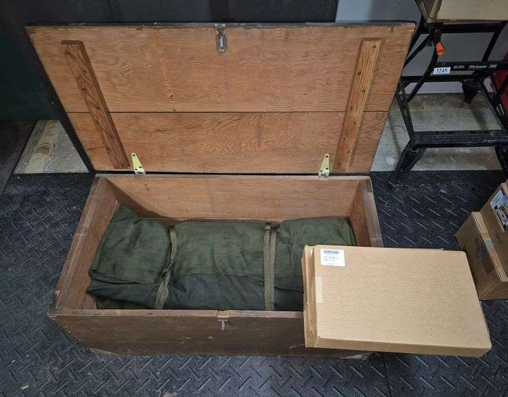 Military surplus items, large brown wood crate/foot locker with ...