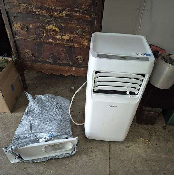 Midea indoor air conditioner - Mark Van Hook, Auctioneer
