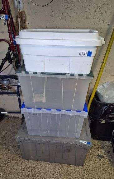 Four empty plastic storage totes - Mark Van Hook, Auctioneer