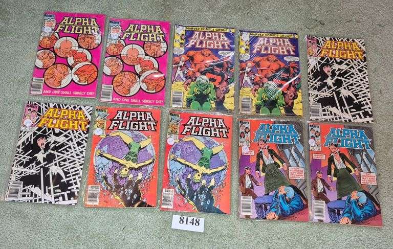 Ten comic books - Mark Van Hook, Auctioneer