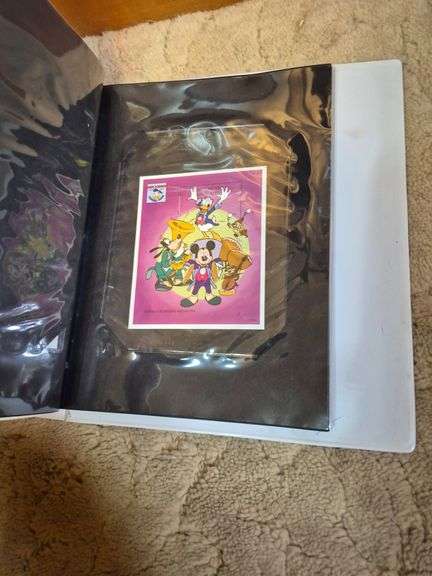 6 Disney stamp albums - Mark Van Hook, Auctioneer