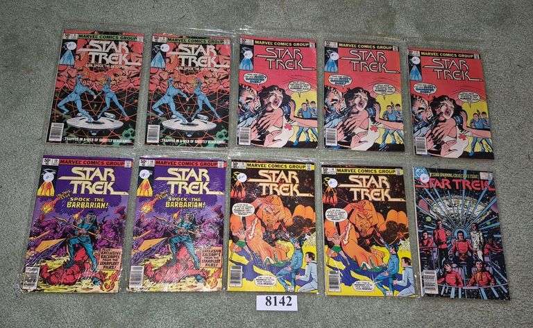 Ten comic books - Mark Van Hook, Auctioneer