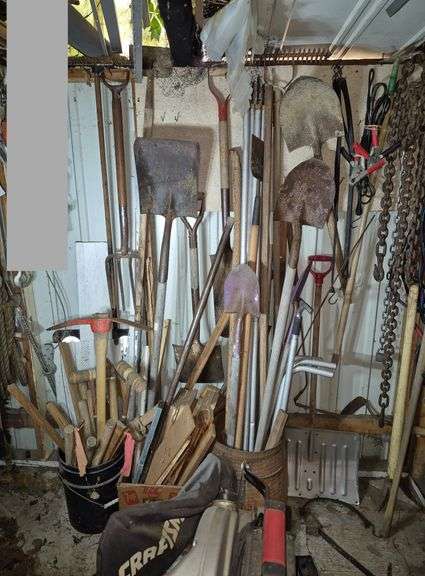 Large lot of yard tools, Spud bar, tree trimmers, chain, xe's, jumper ...
