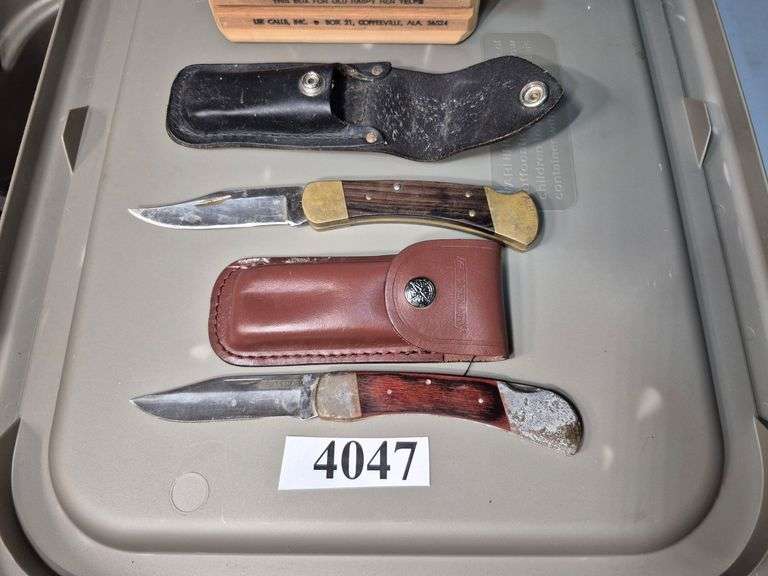Buck and Guidesman lockblade knives in sheaths, Ben Lee turkey call ...