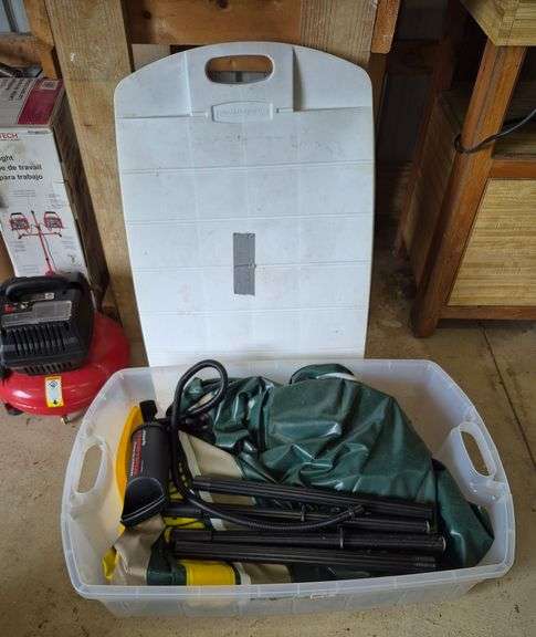 Seahawk inflatable raft with pump and paddles in plastic storage tote ...