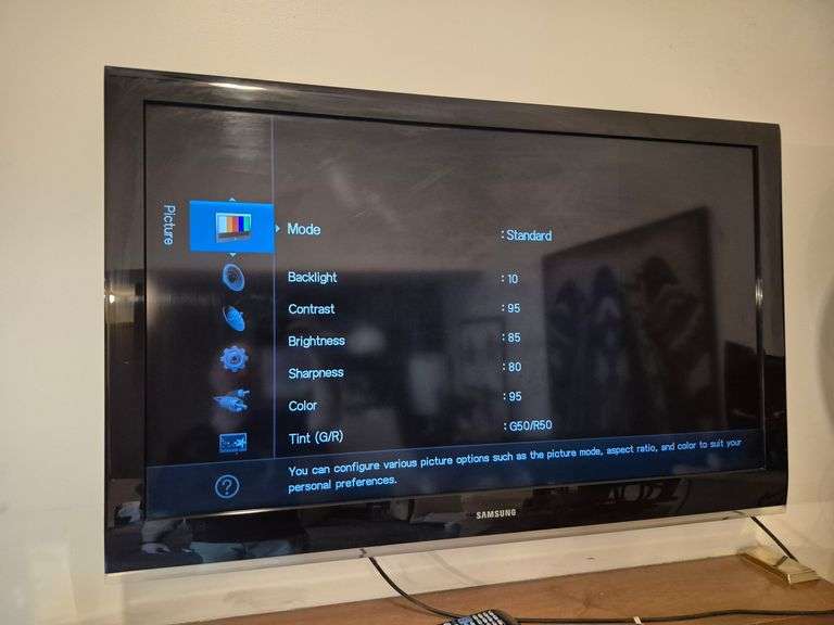 Samsung 46 inch TV with remote - Mark Van Hook, Auctioneer