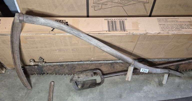 Two man saws, whole auger, scythe - Mark Van Hook, Auctioneer