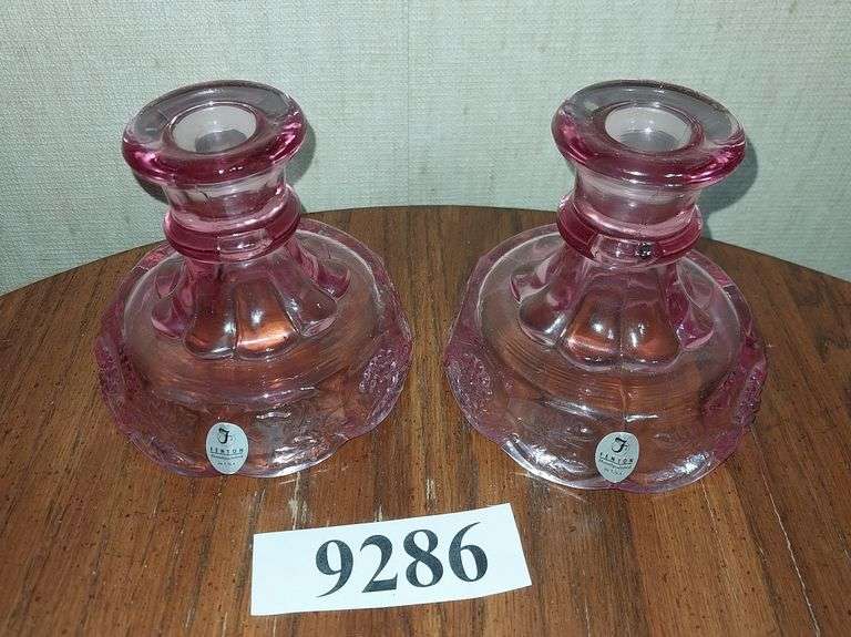 Pair of pink glass Fenton candlesticks - Mark Van Hook, Auctioneer
