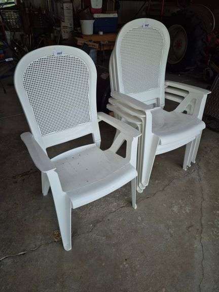 Set of four white plastic stacking reclining outdoor chairs - Mark Van ...