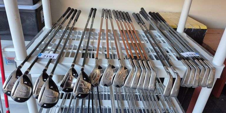 Golf clubs on second shelf including Warrior woods, hippo hex 2 Woods ...