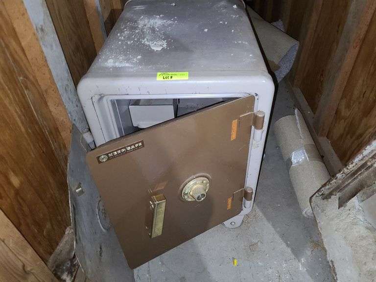 Metal Keep/Safe. Basement. - Ness Bros Realtors & Auctioneers