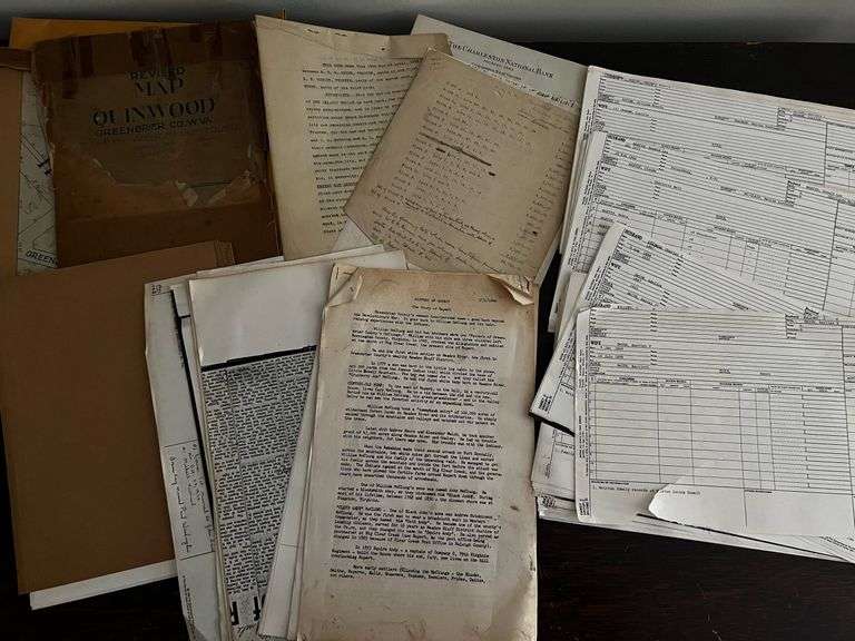 Tabletop of Rupert and Quinwood paper ephemera - NGW Auctions