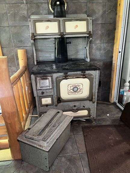 Beautiful Wrought Iron Range company Home Comfort cast iron and ...
