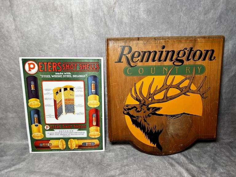 Reproduction Peters and wooden Remington sign - NGW Auctions