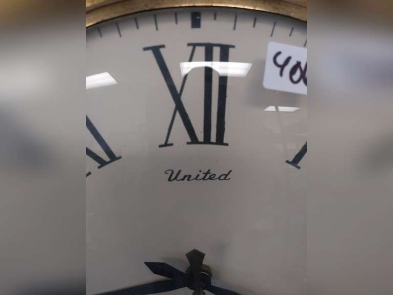 United wall clock shaped like pocket watch - Northern Kentucky Auction, LLC