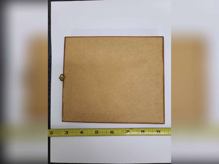 Man silhouette in square frame - Northern Kentucky Auction, LLC