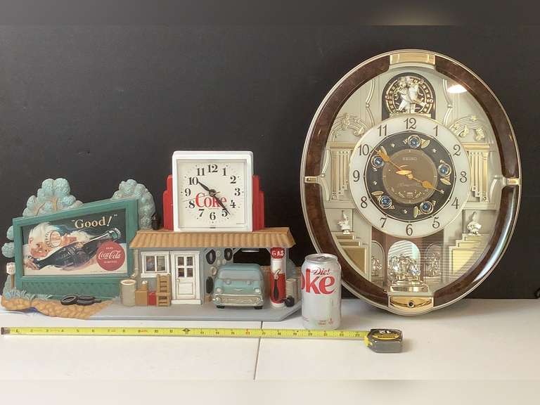 Two battery operated clocks. Coca-Cola clock measures approximately 21 ...