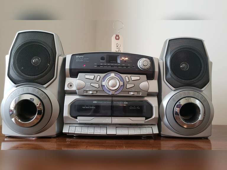 GPX home music system, powered on - Northern Kentucky Auction, LLC