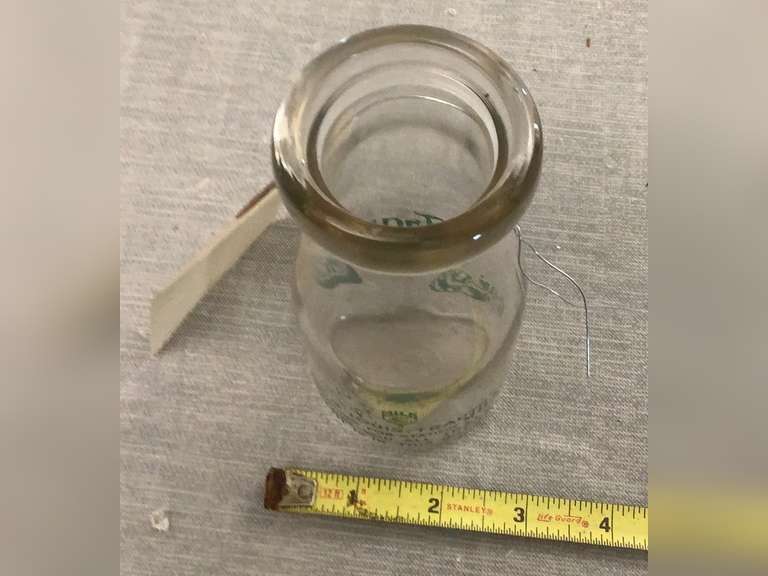 Louis Trauth Dairy bottle, 5.5” tall. - Northern Kentucky Auction, LLC