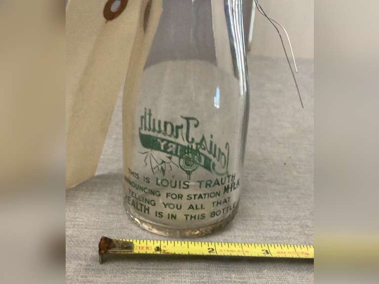 Louis Trauth Dairy bottle, 5.5” tall. - Northern Kentucky Auction, LLC