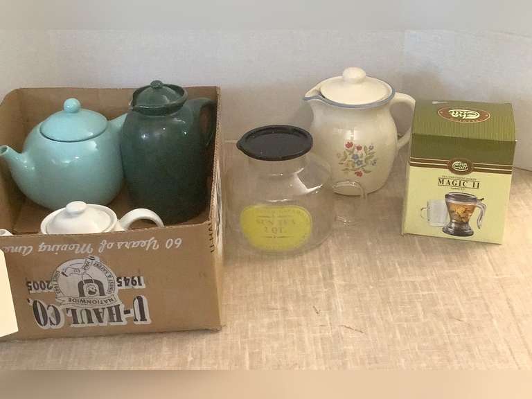 Ceramic tea pods, one stoneware pot, glass sun tea pot and Chai Cult ...