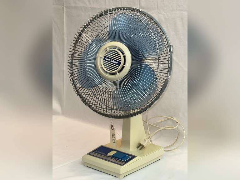 Gold Star oscillating fan - powered on - Northern Kentucky Auction, LLC