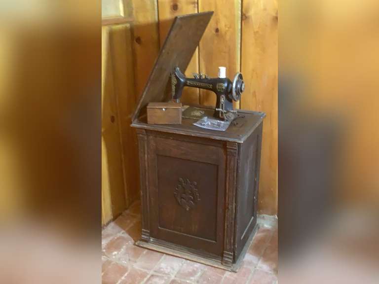 Minnesota Treadle sewing machine with wood cabinet, attachments and ...