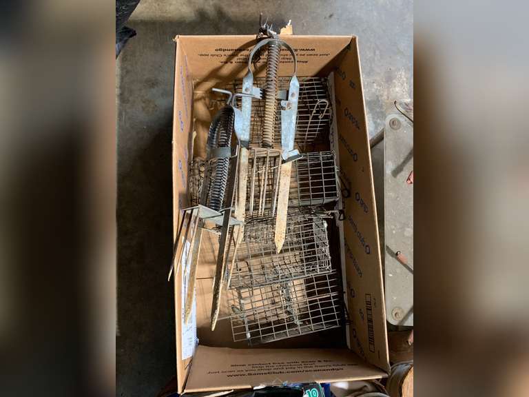 Various traps-mole traps, heavy string, garbage bags, and small rope ...