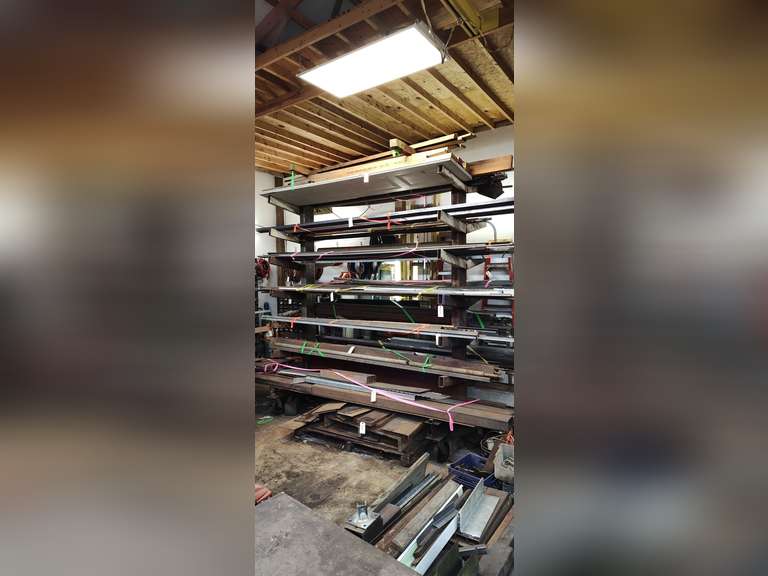 Heavy duty steel rack on casters.(Rack ONLY no content) Approximately ...