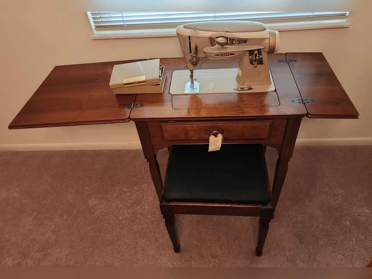 Singer sewing machine model 500A with table and chair, approx. 50" x17 ...