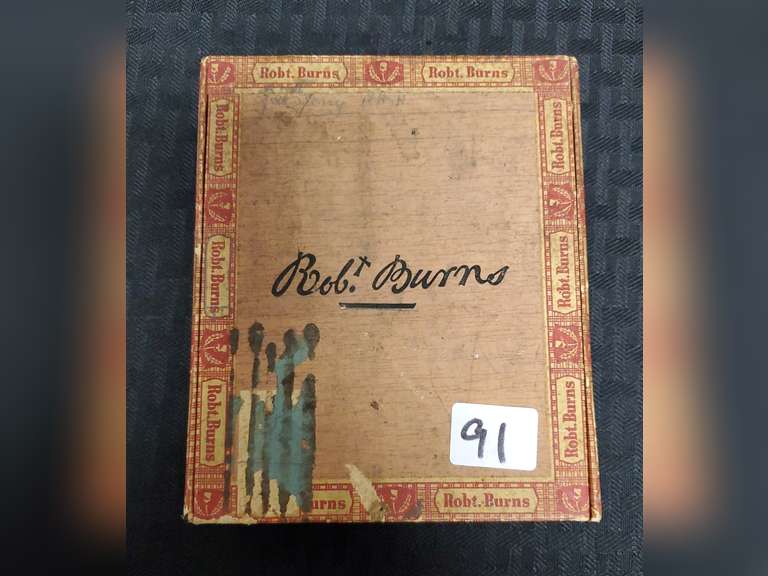 Rob Burns cigarillos box full of marbles - Northern Kentucky Auction, LLC