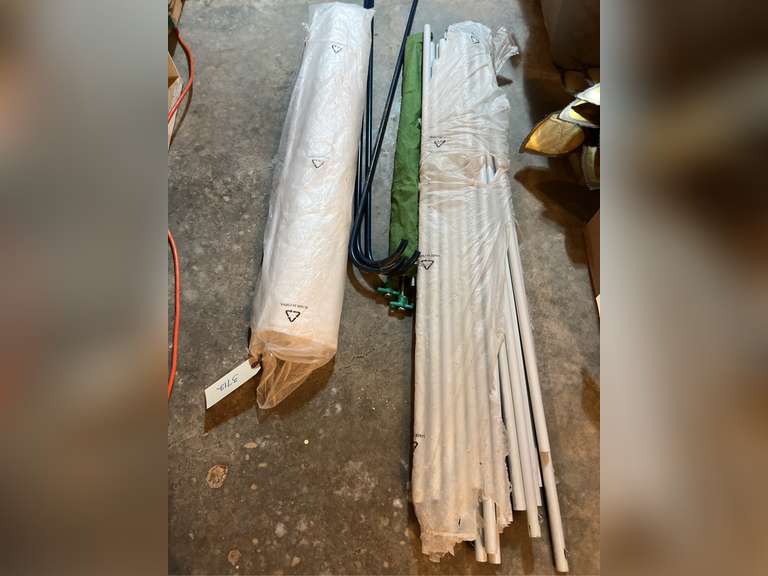 Poles, vinyl shelter and tent poles. - Northern Kentucky Auction, LLC