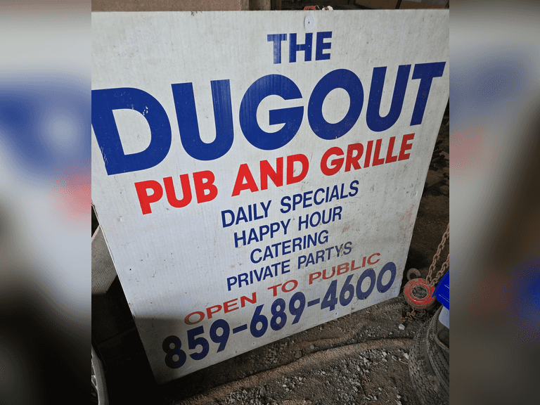 "The Dugout" sign (plastic) and Bud Light Platinum sign (metal ...