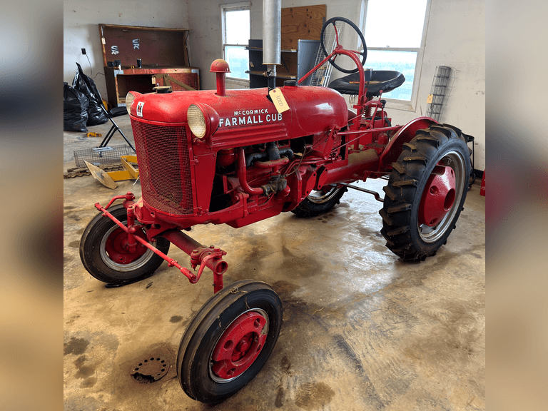 Farmall Cub. We did not try to start it. No fuel in the tank but the ...