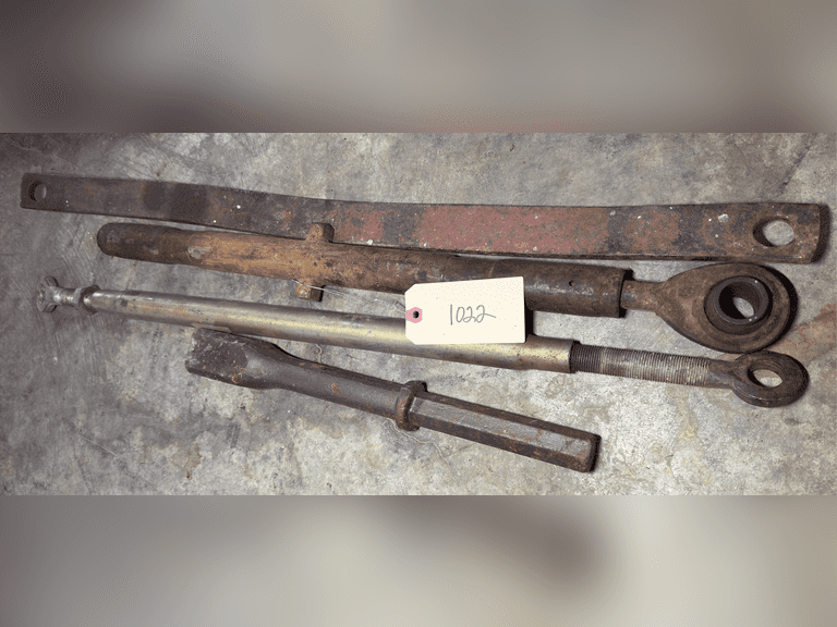One complete top link, 1/2 top link, jackhammer compactor/driver bit ...