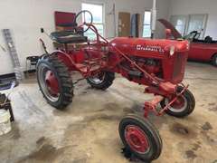 Farmall Cub. We did not try to start it. No fuel in the tank but the ...
