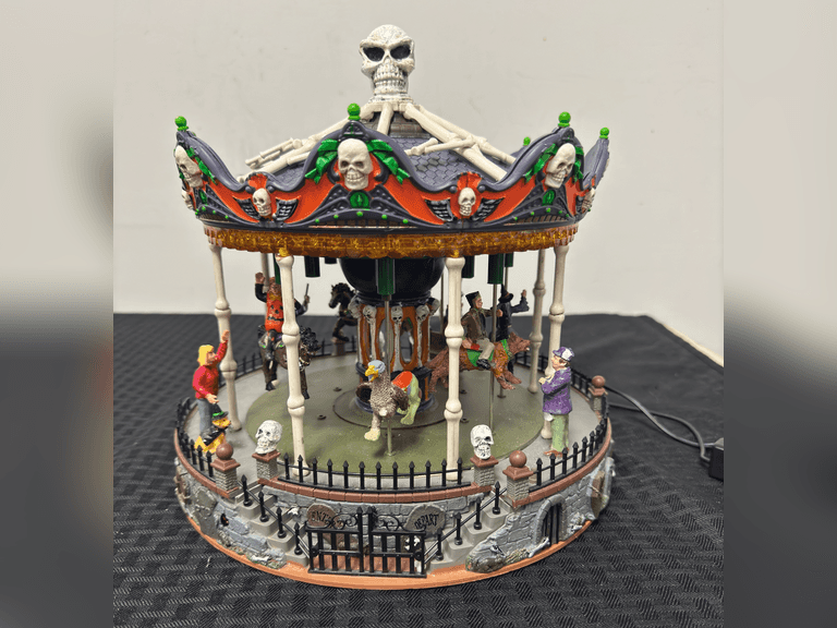 Scary-Go-Round SKU#: 34605 Description: Carousel revolves. Animals rise ...