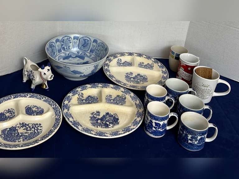 Blue and cream divided china plates, cups and bowl. Delft creamer which ...