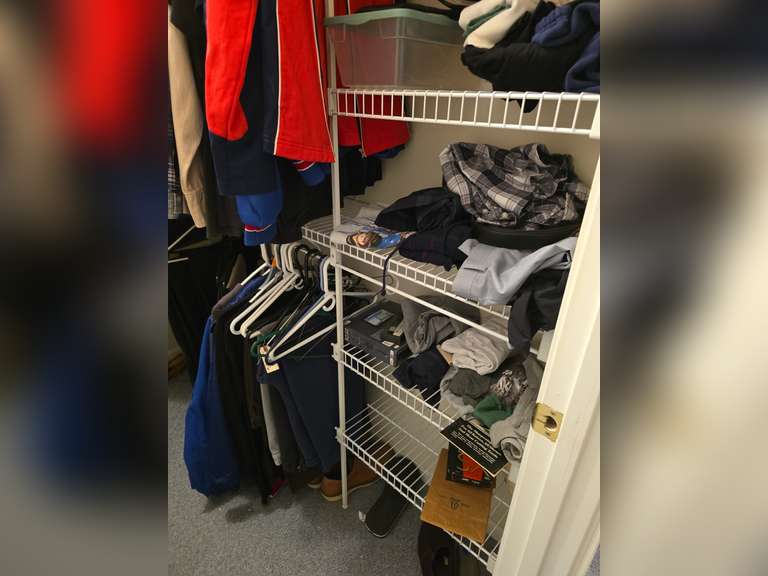 Right side of closet, men's clothing - Northern Kentucky Auction, LLC