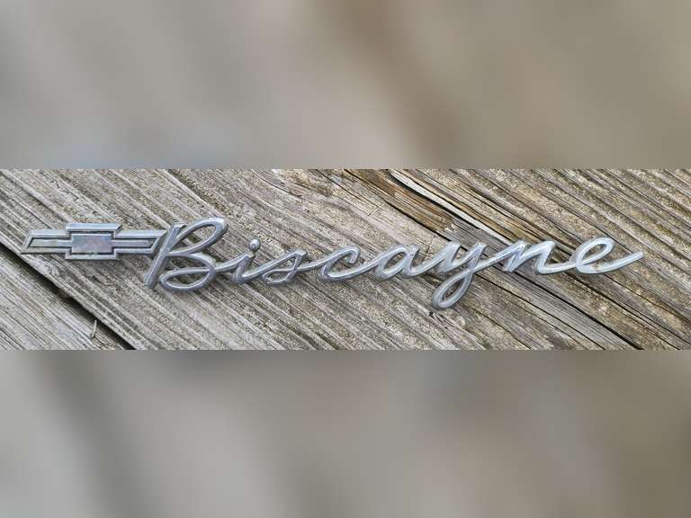 Chevrolet Biscayne emblem - Northern Kentucky Auction, LLC