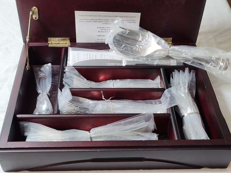 Yamazaki tableware utensils appear to be new in the package with ...