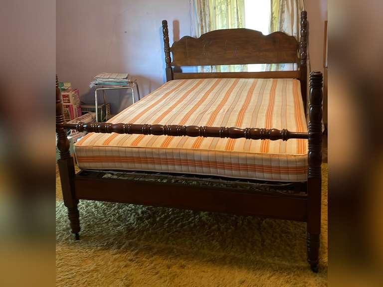 Queen size wood bed. 50” t headboard, 41” t footboard. Bed is 57 1/2” w ...